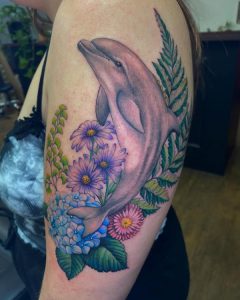 The Beauty of a Simple Dolphin Tattoo: Mythology, Symbolism, and ...
